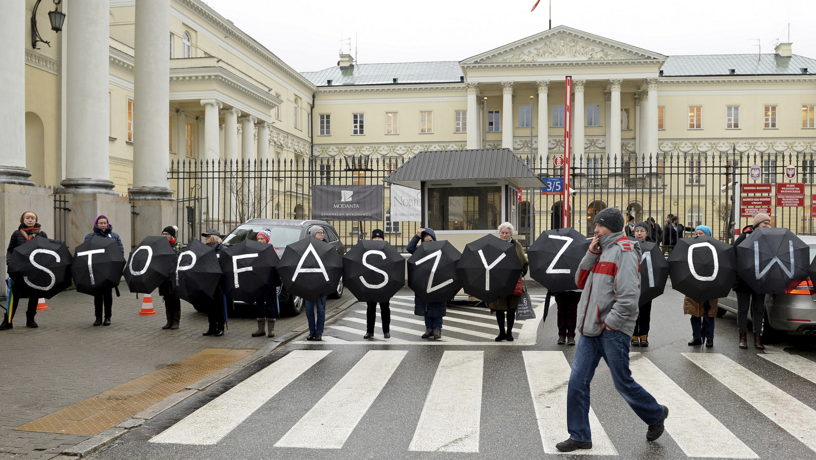 Umbrellas forming a slogan Stop Fascism in Warsaw, Poland.